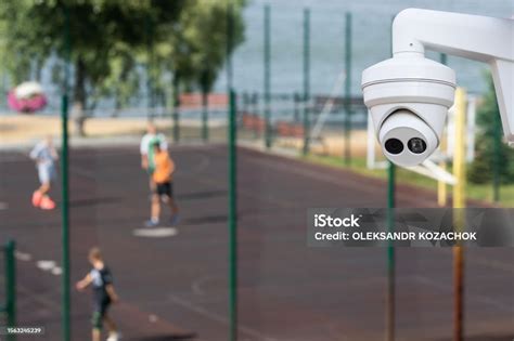 Outdoor Cctv Monitoring Security Cameras At A School Playground Stock