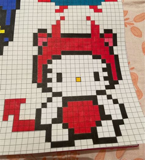 Hello Kitty по клеткам Hello Kitty дьявол по клеточкам Легкие рисунки Рисунки крестов Рисунки