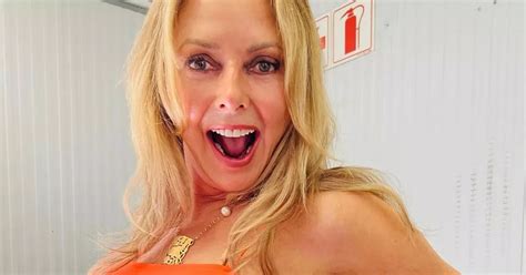 Naked Carol Vorderman Trapped On Treadmill After Stripping Off For