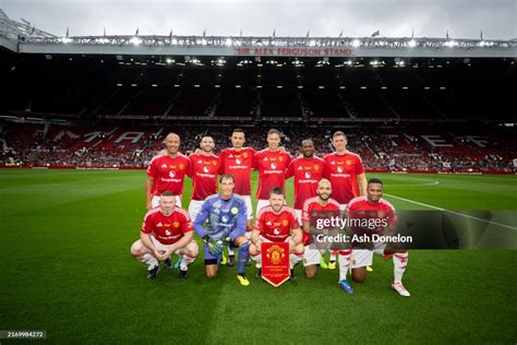 The Manchester United Legends Line Up For A Team Photo Prior To The