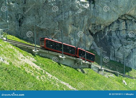 Famous Cogwheel Train Climbing To The Top Of Mount Pilatus In Canton