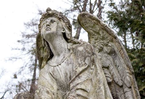 A Beautiful Angel Statue Close Up With Large Wings Guardian Angel