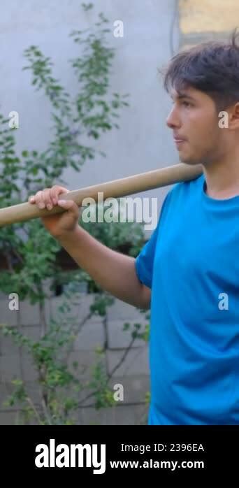 Digging Field Young Farmer Man Doing Work With Pickaxe Digging Shovel Tools Farming In The