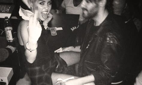 Miley Cyrus Tweets Picture Of Herself In A Provocative Pose With Male