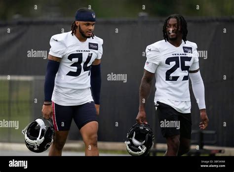 Houston Texans Safety Jaylen Reed 34 And Safety Russ Yeast 25 Walk