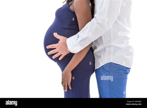 Man hugging pregnant woman hi-res stock photography and images - Alamy