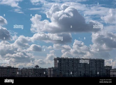 Spring Windy Sky With White Clouds Above Residential District In Moscow