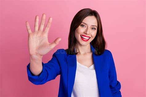 Photo Of Cheerful Friendly Adorable Lady Waving Arm Demonstrate Hello