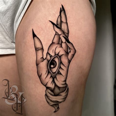 Traditional Hand Eye Tattoo