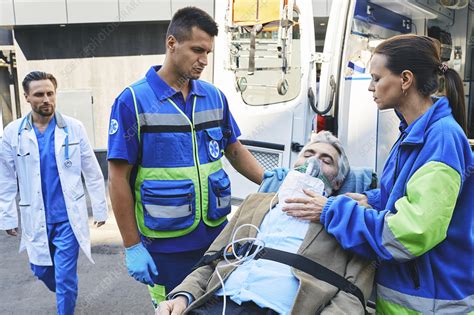 Paramedics With Patient Stock Image F0375061 Science Photo Library