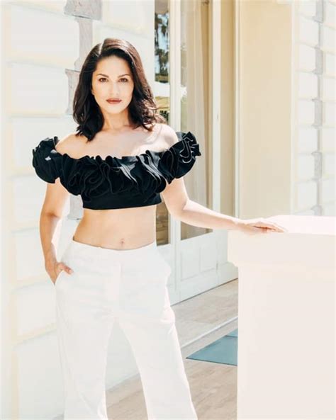 Sunny Leone Exudes Glamour In Black Crop Top And White Pants See Pics