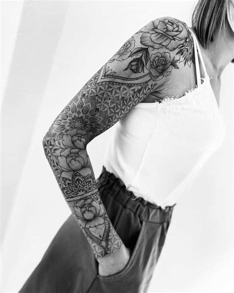 Women With Black And White Sleeve Tattoos