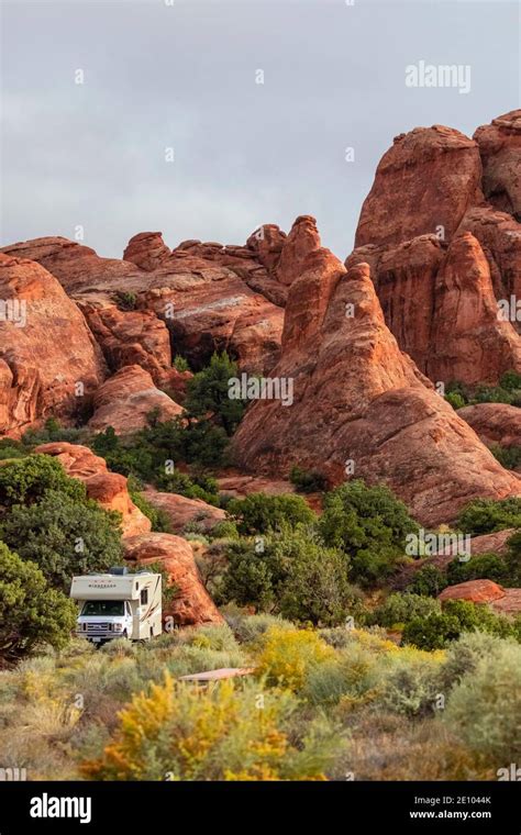 Motorhome In Front Of Rock Scenery Devils Garden Campground Arches