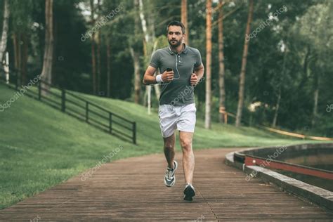 Man Jogging In Park