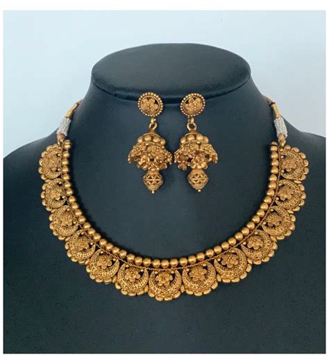 Antique Gold Finished Necklace Set With Matching Jhumkas South Indian
