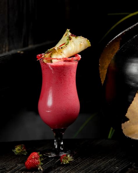 Free Photo Pink Smoothie With Slice Of Pineapple
