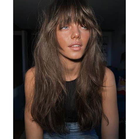 How To Cut French Bangs 5 Tips For The Perfect Eye Grazing Fringe