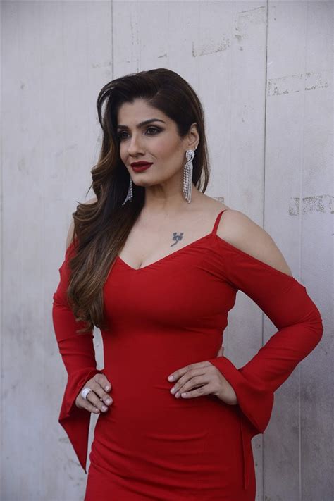 Bollywood Actress Raveena Tandon Hot In Red Dress Photos