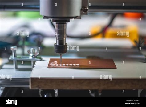 Machine With Numerical Control Cnc Carries Out Milling Of Printed Circuit Boards Circuit