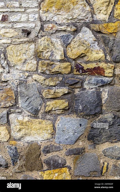 Stone Cladding With An Aged Rustic Look Is Created By Old Rustic Bricks And Stones Background