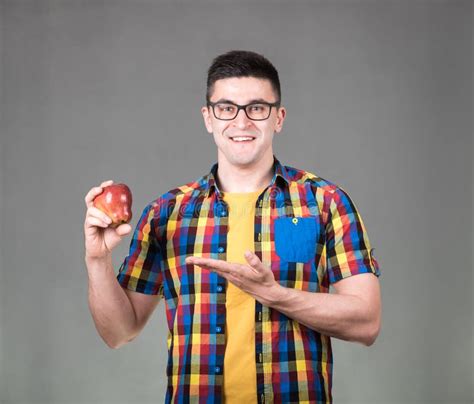 Man With Apple On Gray Background Stock Image Image Of Eyesight