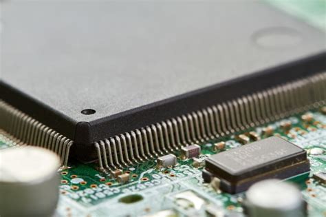 Premium Photo Closeup Of Computer Chip On A Part Of Electronic Printed Circuit Board
