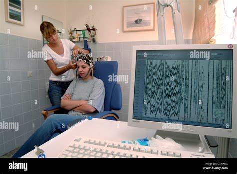 A Receptionist Prepares A Patient For An EEG In A Neurologist Surgery In Iserlohn Germany 30