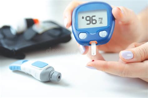 Woman Is Holding A Blood Glucose Meter Stock Image Image Of Insulin