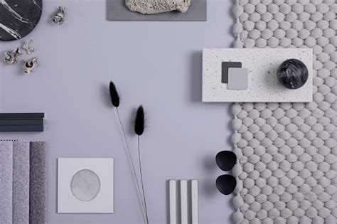 세련된 건축가와 인테리어 디자이너 무드 보드 직물 과 페인트 샘플 패널 및 타일 회색 색상 팔레트의 플랫 평신도 구성 맨 위 보기입니다 공간을 복사합니다 템플렛 0명에 대한