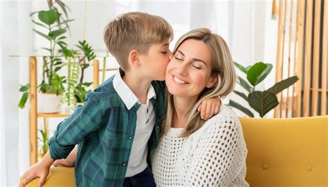 Premium Photo Mother Hugging Her Son On Mothers Day