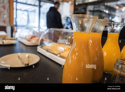 Breakfast Buffet With Orange Juice In Luxury Hotel Dining Area Stock