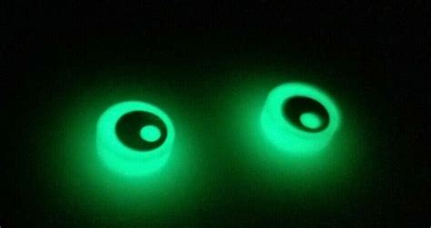 Green Glowing Eyes In The Dark