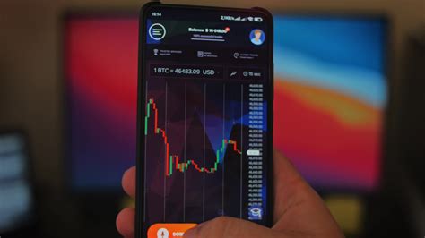 Caucasian Male Making A Payment With Bitcoins Cryptocurrency Using His