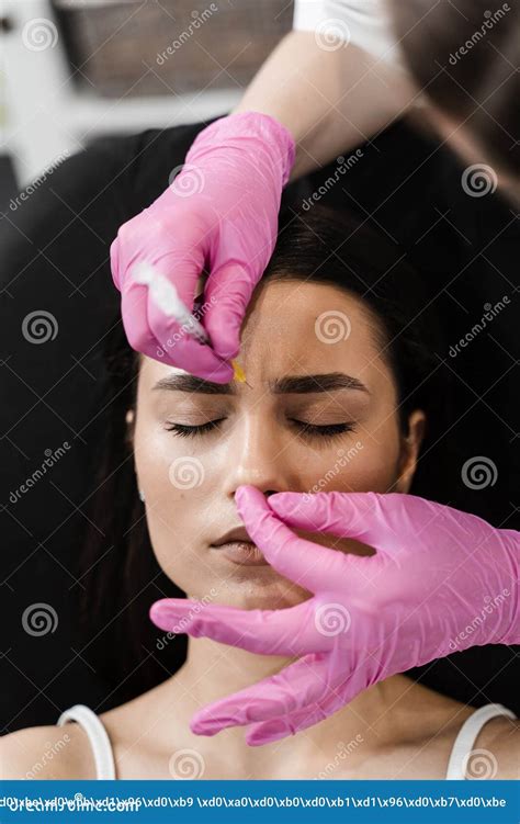 Beautician Is Injecting Botulinum Toxin To Correct Mimic Wrinkles And Hyperhidrosis For Young