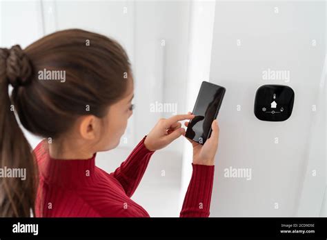 Smart Home Automation Woman Using Phone App Regulating Indoor