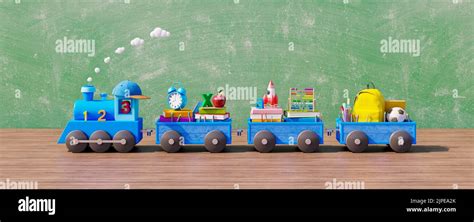 Blue Train And Wooden Wagons Filled With School Supplies Standing In