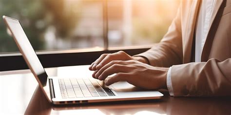 Premium Ai Image Closeup Of Man Hands Typing On Laptop Keyboard In A Cafe