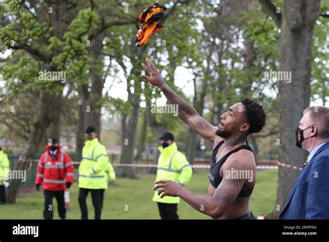 Mallik Wilks 7 Of Hull City Throws His Shirt To The Fans Outside The
