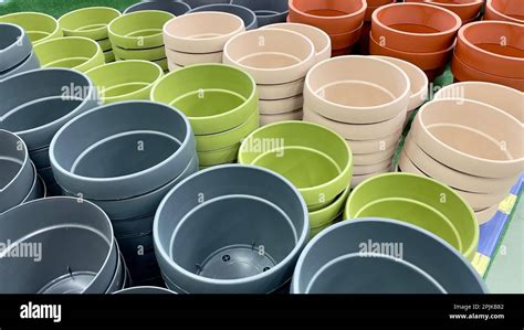 Close Up Of Empty Flower Pots In A Store Or Greenhouse Colorful Pots