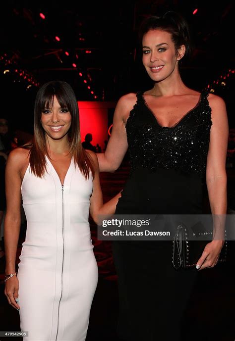 Megan Gale And Eva Longoria Pose Before The Camilla Show During News
