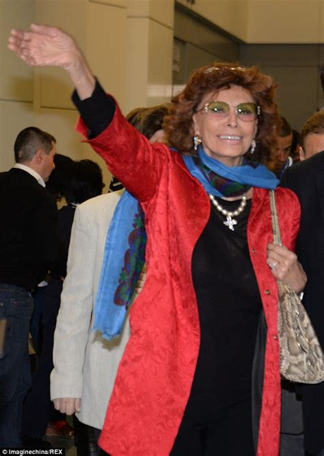 Sophia Loren 80 Wears A Vixen Red Two Piece Suit As She Attends