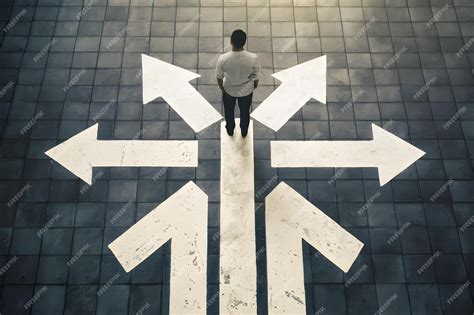 Premium Photo Individual Stands On Directional Arrows Representing Choice And Direction
