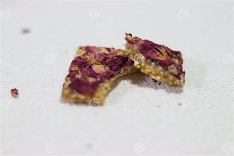 Dessert Packed With Vibrant Nuts And A Glossy Finish Beautifully Showcased On A Clean White