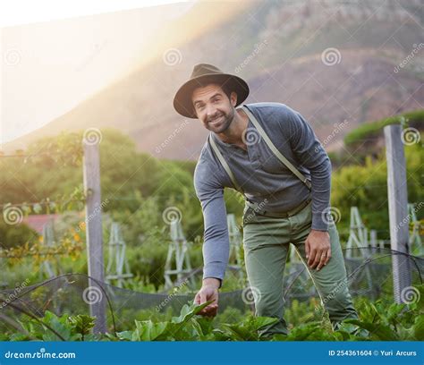 I Couldnt Imagine A Day Without Farming Portrait Of A Young Man Tending To The Crops On A Farm