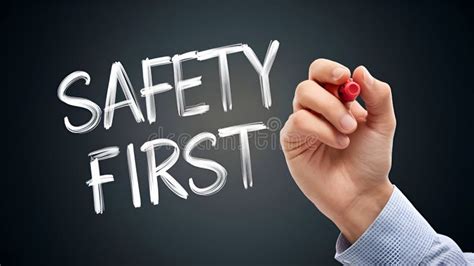 Safety First Concept With Hand Writing On Black Background Emphasizing