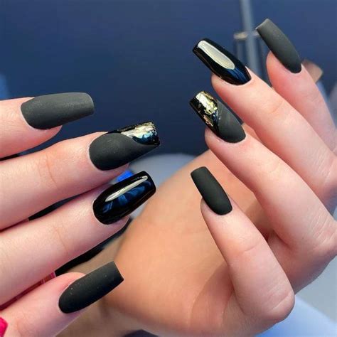 Enjoy The Goth Trend By Dipping Your Fingertips Into The Black Nail Art