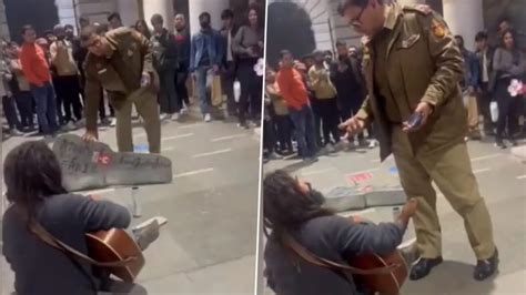 Delhi Policeman Stops Artist From Playing Music In Connaught Place