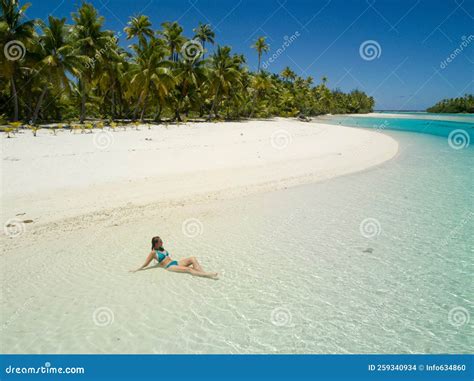 Aerial Young Woman Enjoying Her Vacation By Sunbathing On The Exotic