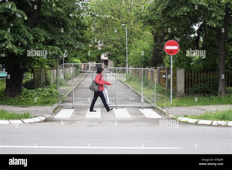 Woman Pass In The Front Of Fence Stock Photo Alamy