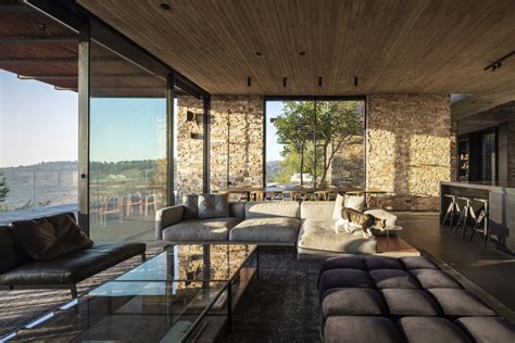A Stone Cladding Villa That Serves As A Bridge Between Communities